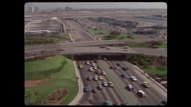 Traffic Near LAX, Los Angeles, USA, 1970s - Footage File