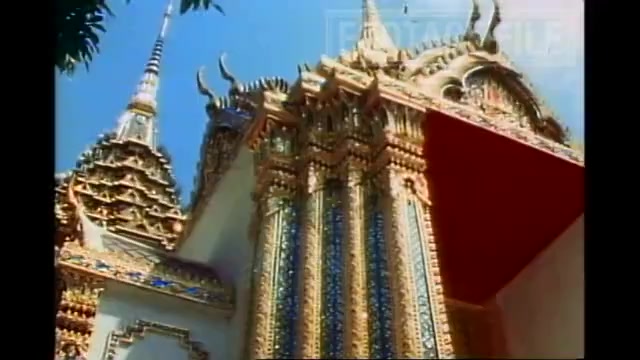 The Royal Palace of Bangkok, pan left the temple and spires - Footage File