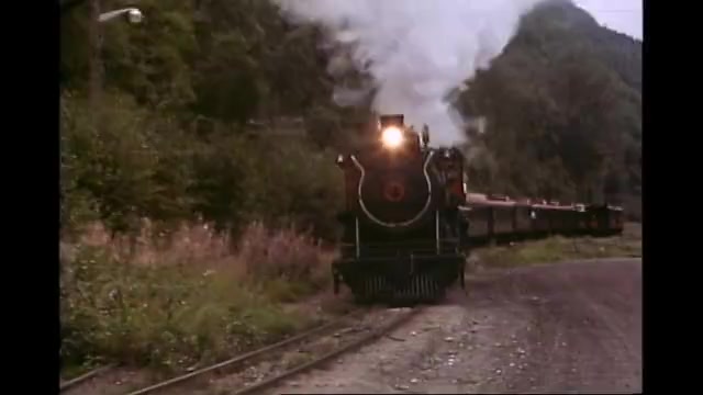 White Pass & Yukon Railroad, Alaska, steam locomotive approaches ...