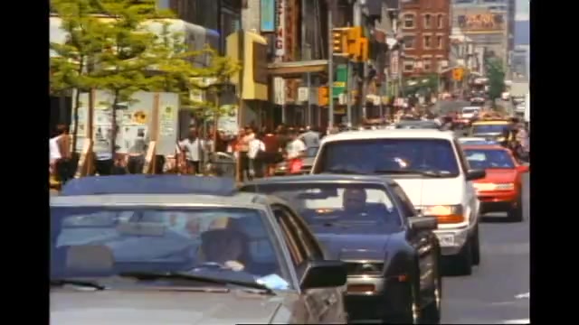 Toronto, 1990, traffic on Younge Street, crushed shot - Footage File