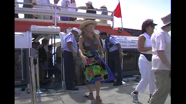 The Queen Mary 2, ocean liner, people leave the QM2 tender at St ...