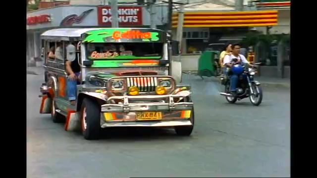 Manila, Jeepneys passing, Manila's inexpensive bus service, shot on ...