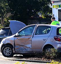 Car hits road sign