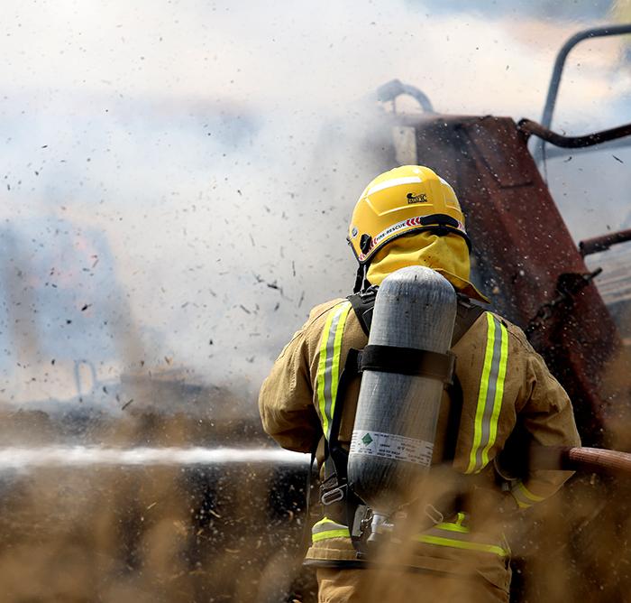 Baler, tractor consumed in fire