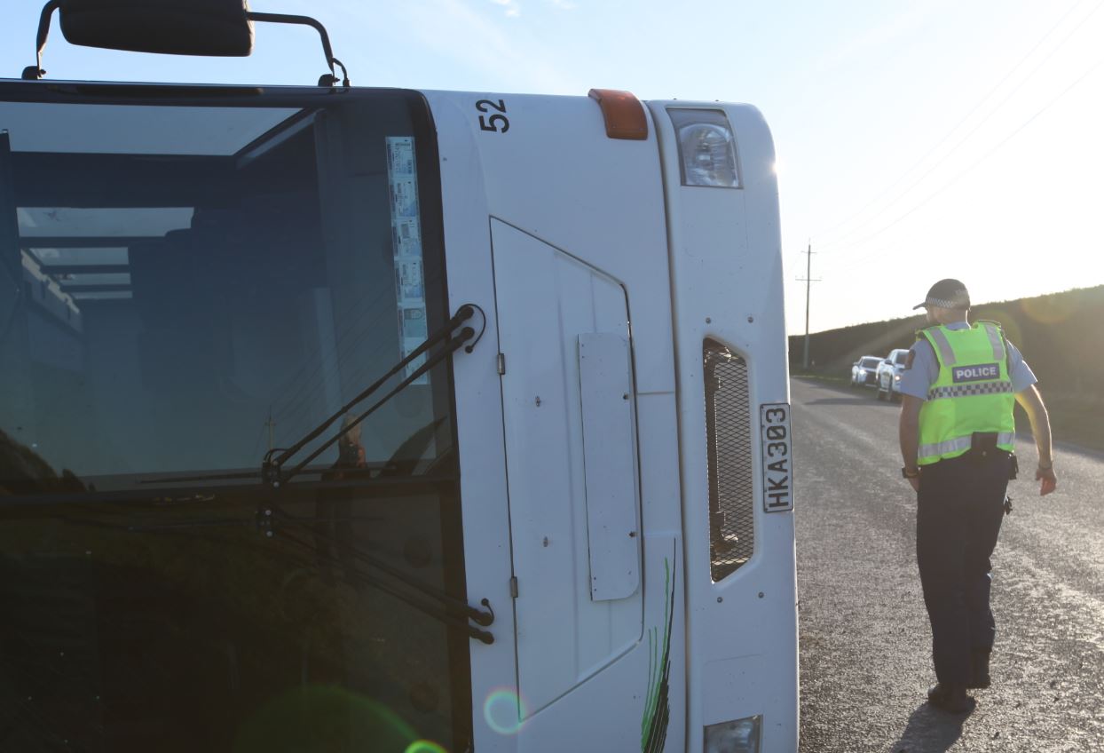 Student helped others out of rolled bus